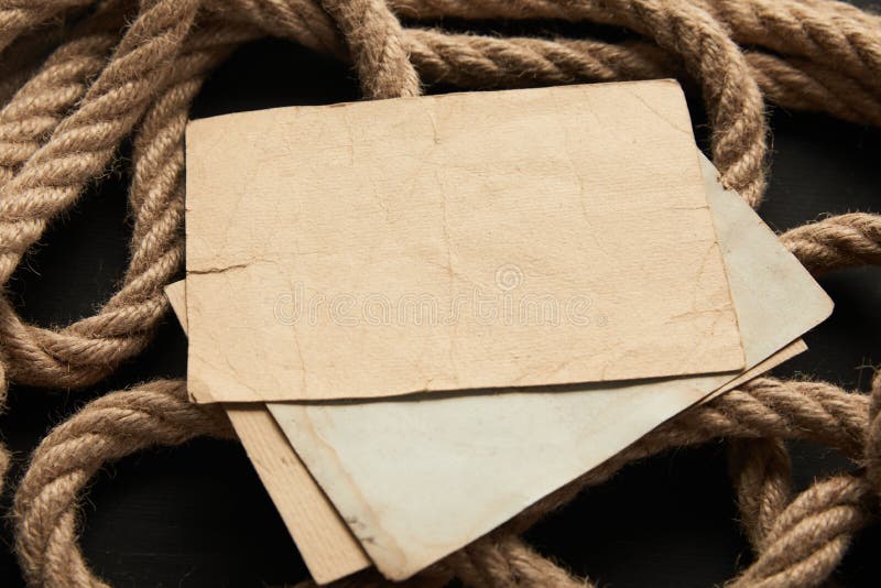Vintage Paper and Rope on Black Stock Photo - Image of painting, rope ...