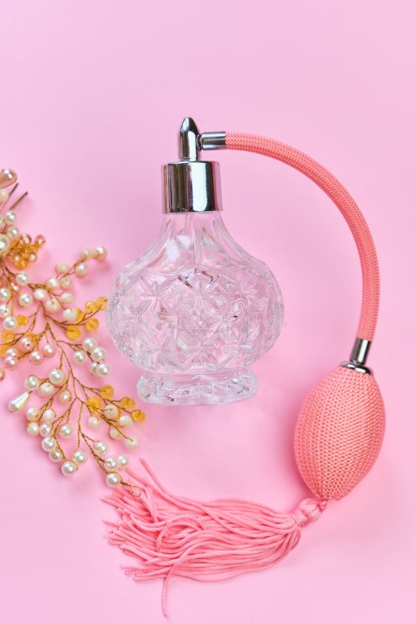 Vintage Perfume Bottle with Atomizer on Pink Background Stock Photo ...