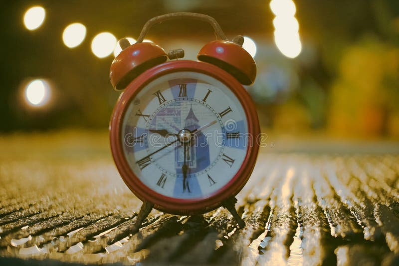 Vintage Photo of a Dark Red Alarm Clock Stock Image - Image of clock ...