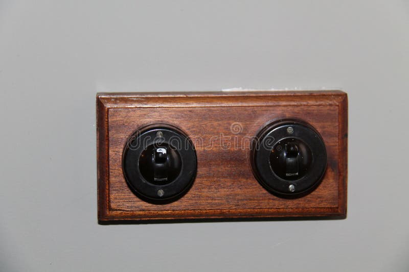 Vintage Plastic Light Switches. Stock Photo - Image of brown, wood ...