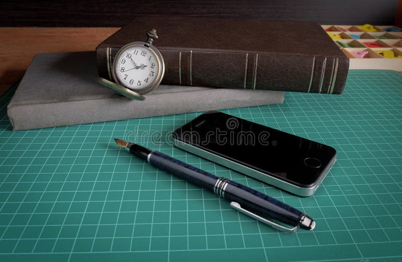 Vintage Pocket Watch with Cell Phone and a Business Tool. Stock Photo ...