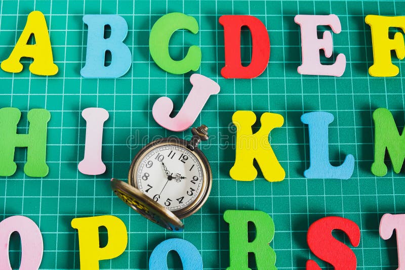 Vintage Pocket Watch on Colorful Text Stock Image - Image of modern ...