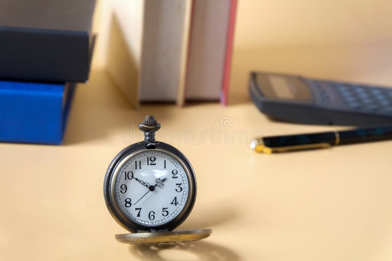 Vintage Pocket Watch on Table Stock Image - Image of clock, metal ...