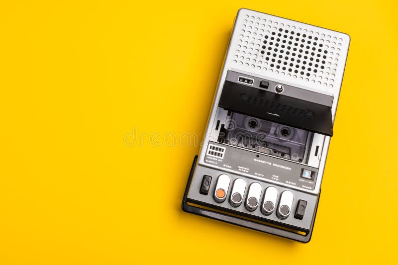 Vintage Portable Cassette Recorder on Yellow Background Stock Photo ...