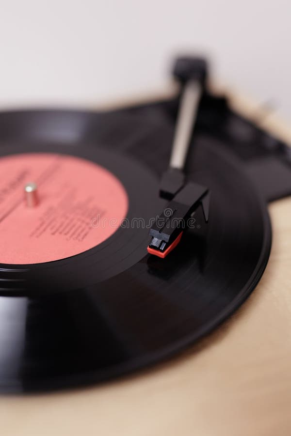 Vintage Portable Record Player Playing a Vynil Record Stock Photo ...