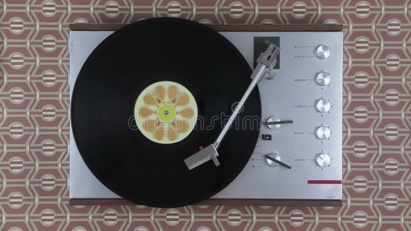 Vintage Record Player in Front of Retro Brown Wallpaper Stock Video ...