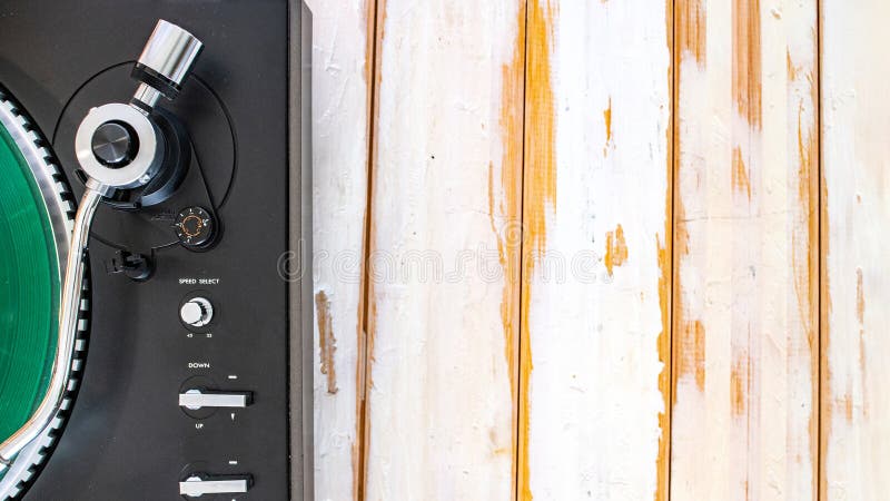 Vintage Record Player Spinning a Vinyl Record with Tonearm. Top View ...