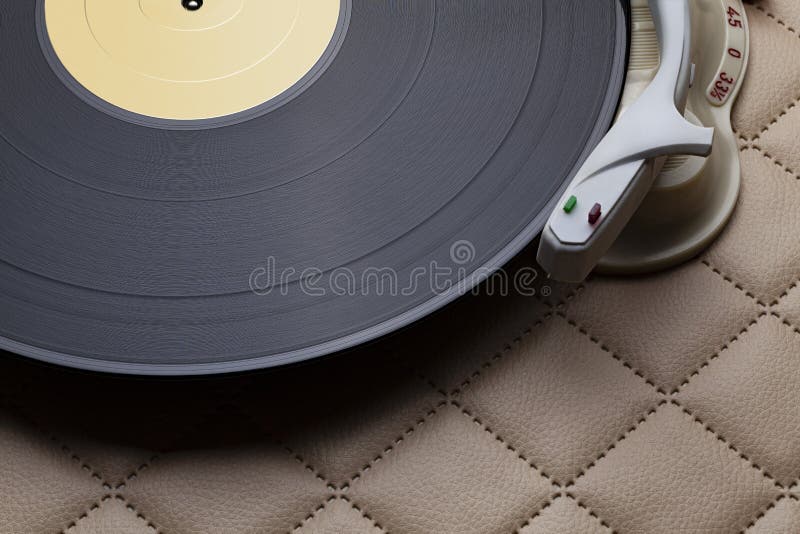 Vintage Record Player with Vinyl Record on Leather Background Stock ...