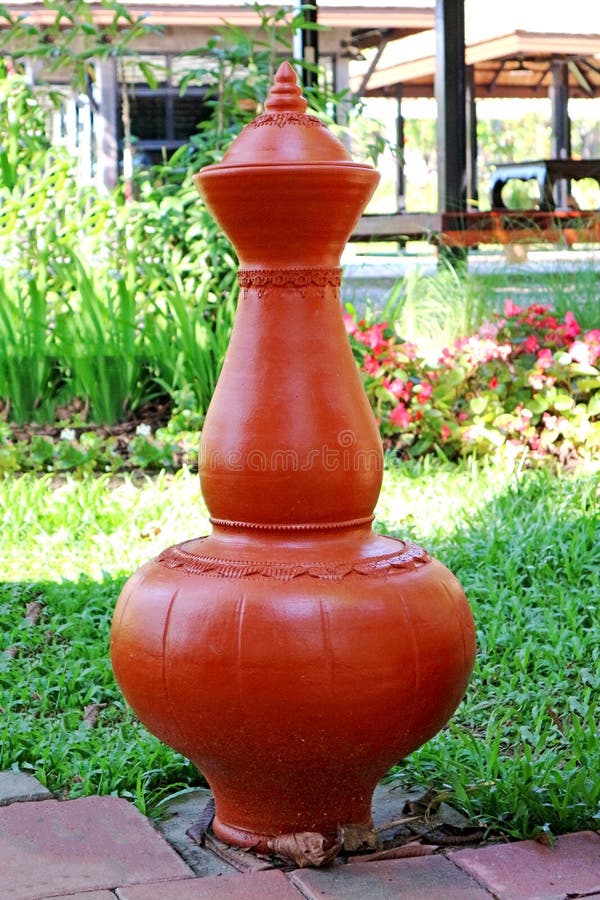 Vintage Red Clay Pot Decorated in the Garden Stock Photo - Image of ...