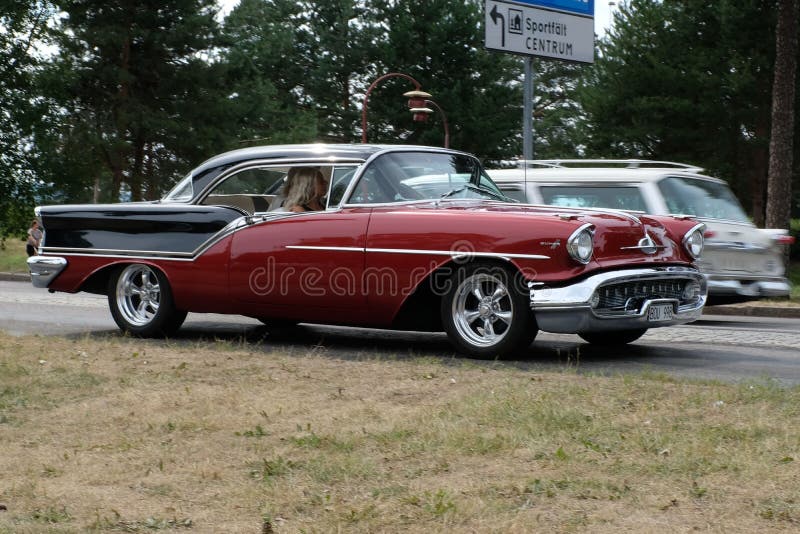 Vintage Red Oldsmobile 88 Car in the Park Editorial Photography - Image ...