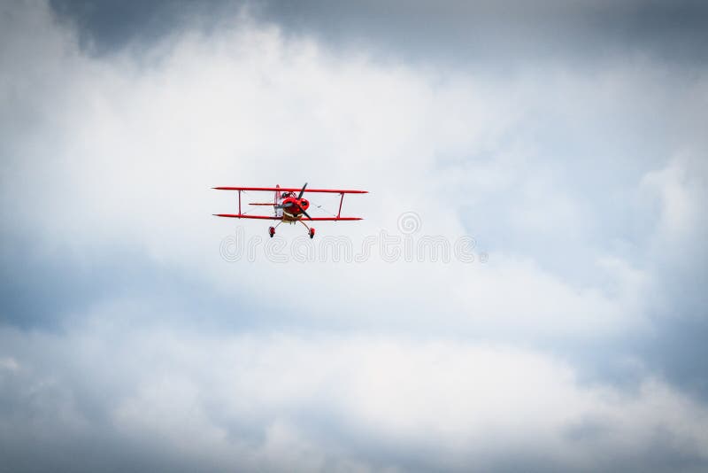 Vintage Red Propeller Plane Flying on a Blue Sky Stock Photo - Image of ...