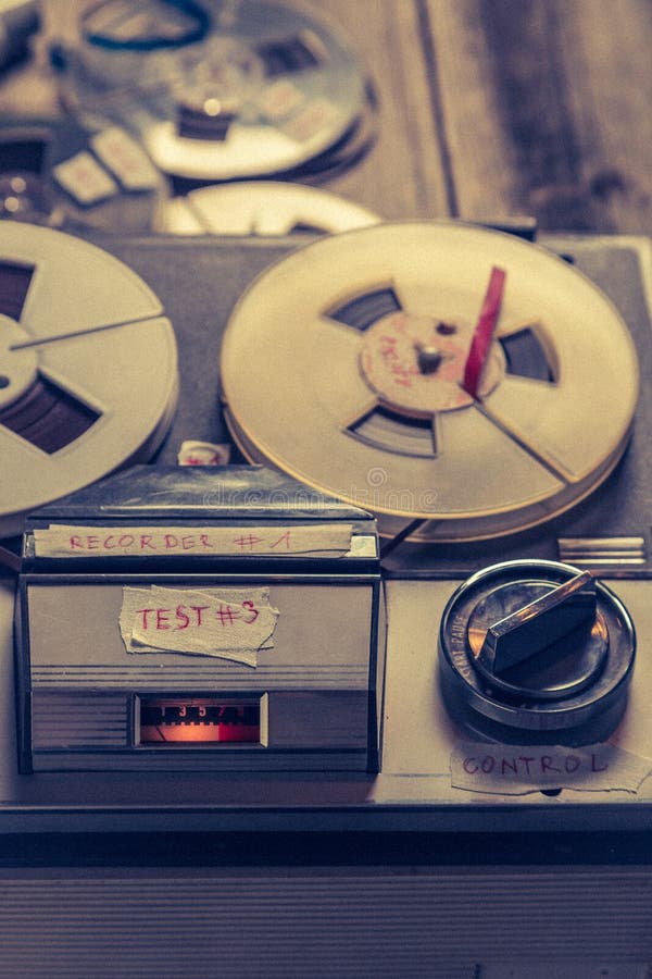 Vintage Reel-to-reel Tape Recorder with Microphone and Roll of Tape ...
