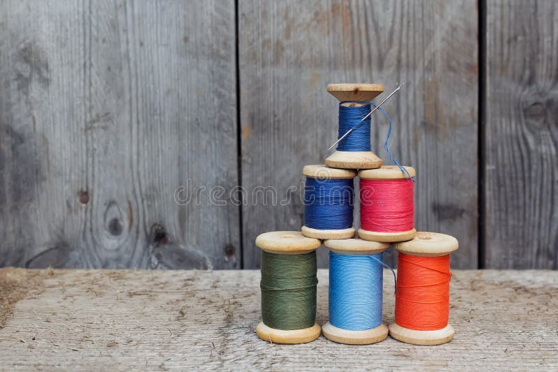 Vintage Reels of Thread and Needle Stock Image - Image of thimble ...