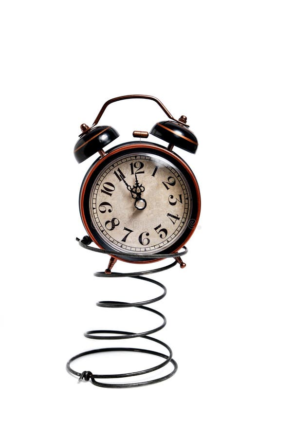 Vintage Retro Alarm Clock Bouncing on a Spring on a White Background 库存 ...