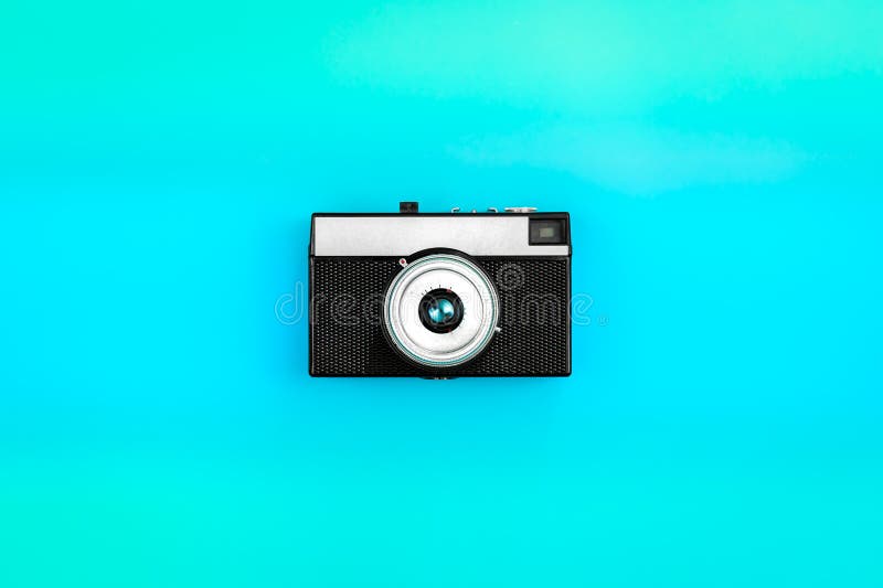 Vintage Retro Camera on a Blue Background, Flat Lay. Stock Photo ...