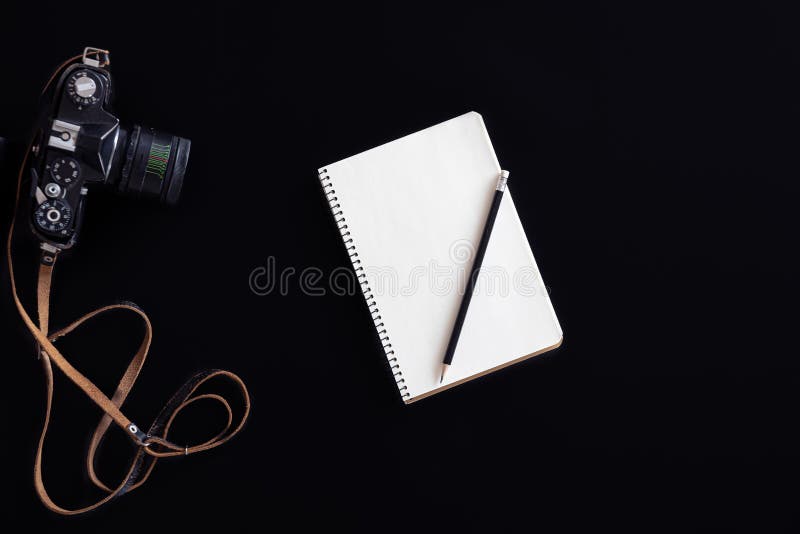 Vintage Retro Camera and Notepad on Black Background, Flat Lay. Stock ...