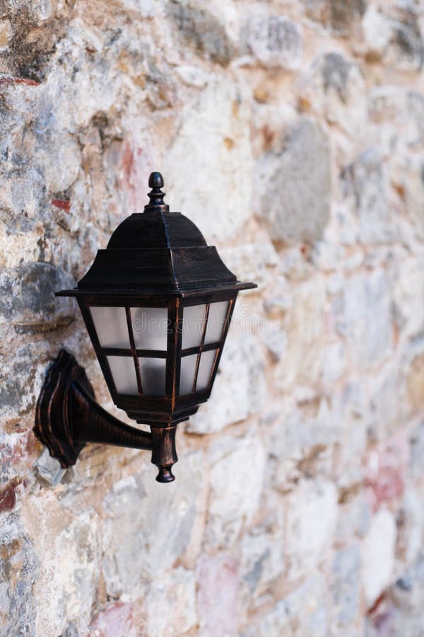 Vintage Retro Lantern on the Wall in the Old City. Side View Stock ...