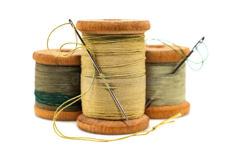 Vintage Retro Spool of Thread on a White Background. Needle with Thread ...