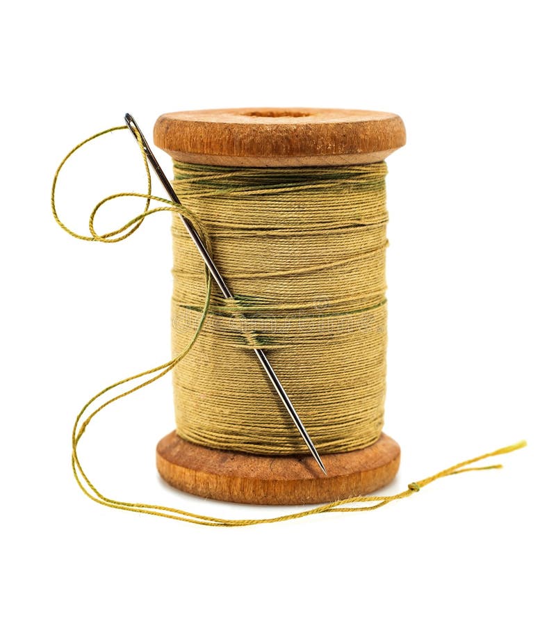 Vintage Retro Spool of Thread on a White Background. Needle with Thread ...