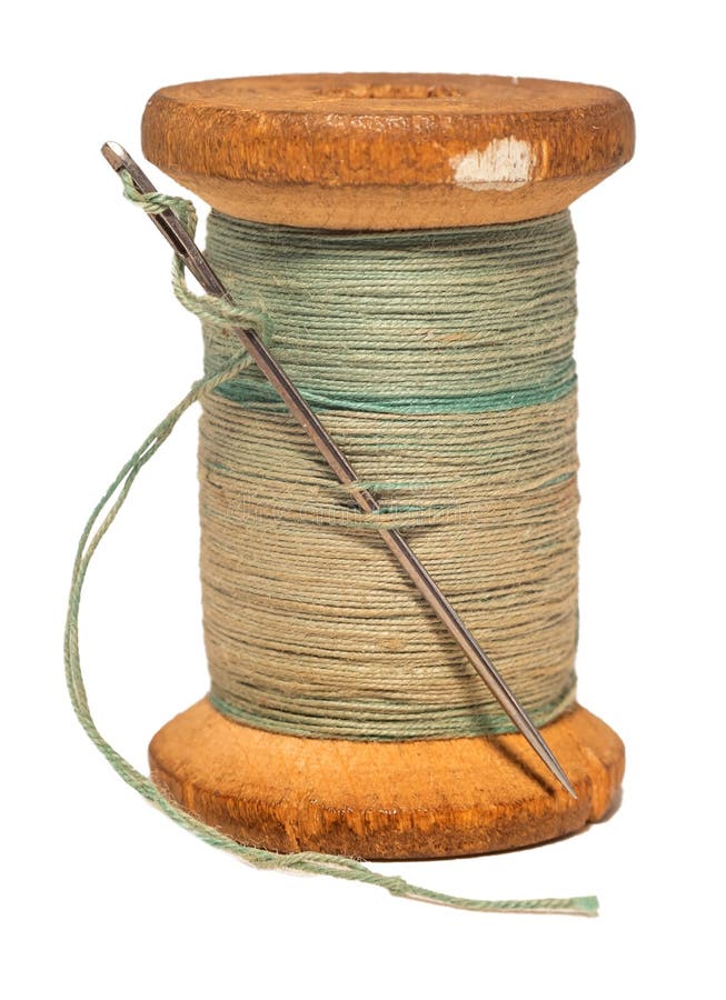 Vintage Retro Spool of Thread on a White Background. Needle with Thread ...