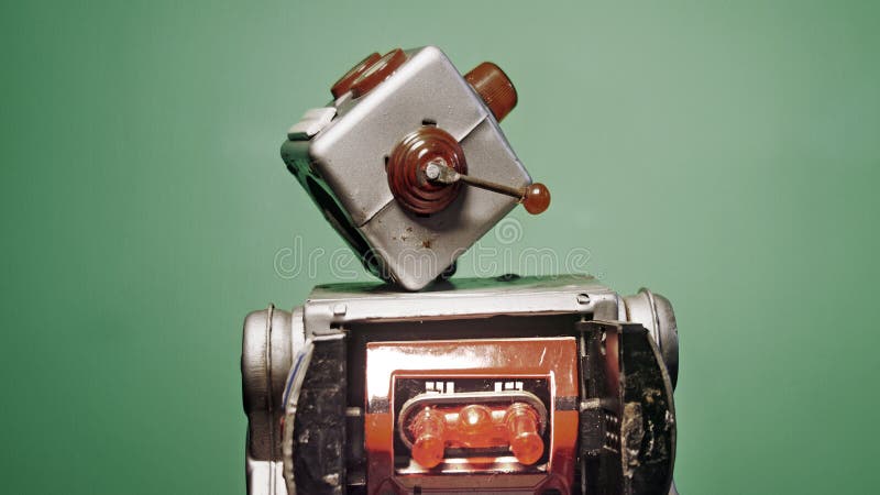 Vintage Tin Toy Robot Looking into the Future of Space Exploration with ...