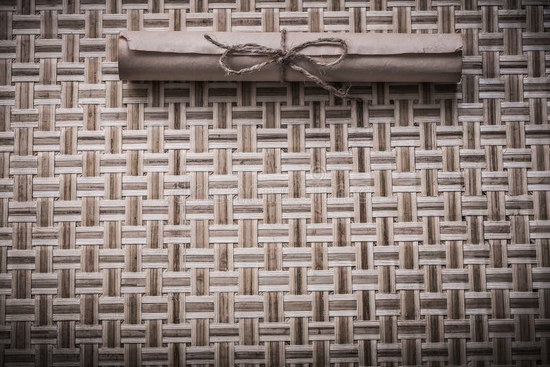 Vintage Rolled Document on Wicker Wooden Mat Stock Image - Image of ...