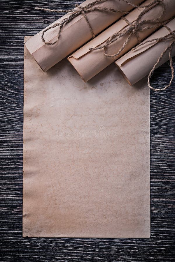 Vintage Medieval Rolled Paper on Woven Wooden Matting Copyspace Stock ...