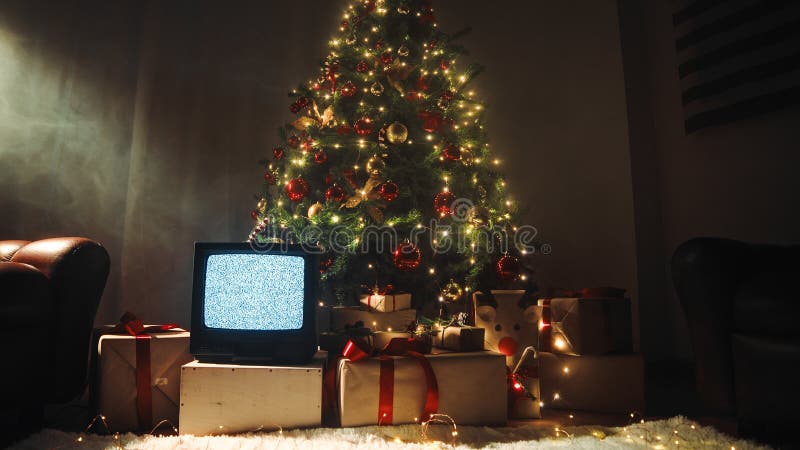 Vintage Room with Christmas Tree and a Static Tv with Noise Stock Photo ...