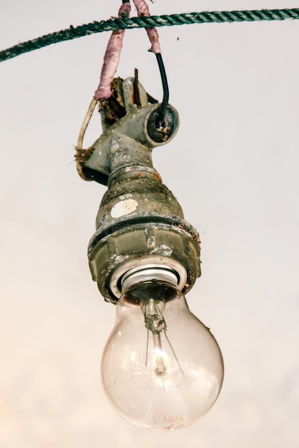 Vintage and Rustic Lightbulb on a Rope Stock Photo - Image of retro ...