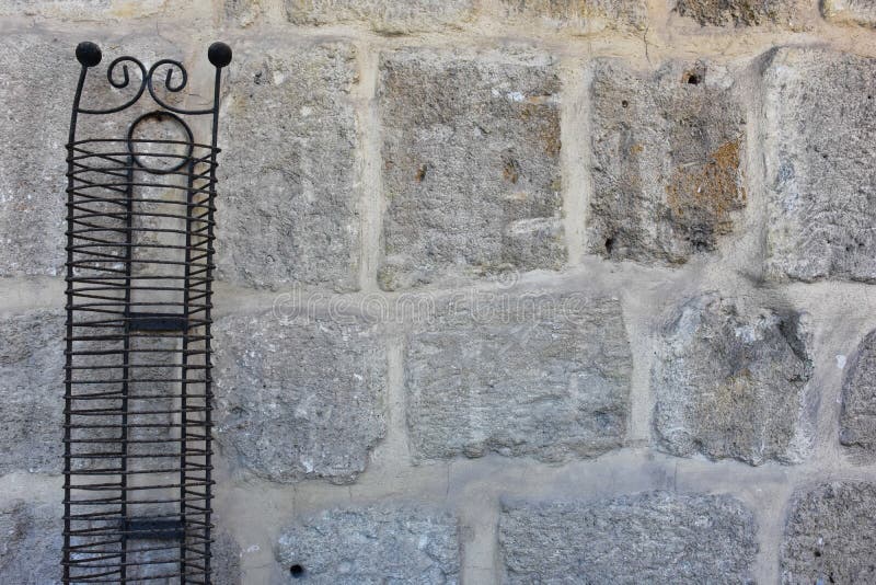 Vintage Rustic Wrought Iron CD Disc Storage Stand in Front of a Old ...