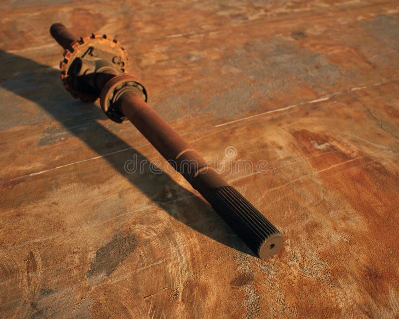 Vintage Rusty Drive Shaft on Rusty Metal Sheet. Stock Image - Image of ...