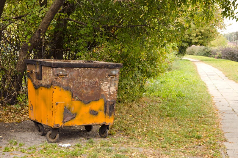 Old rusty dustbin stock image. Image of natural, grass - 84214927