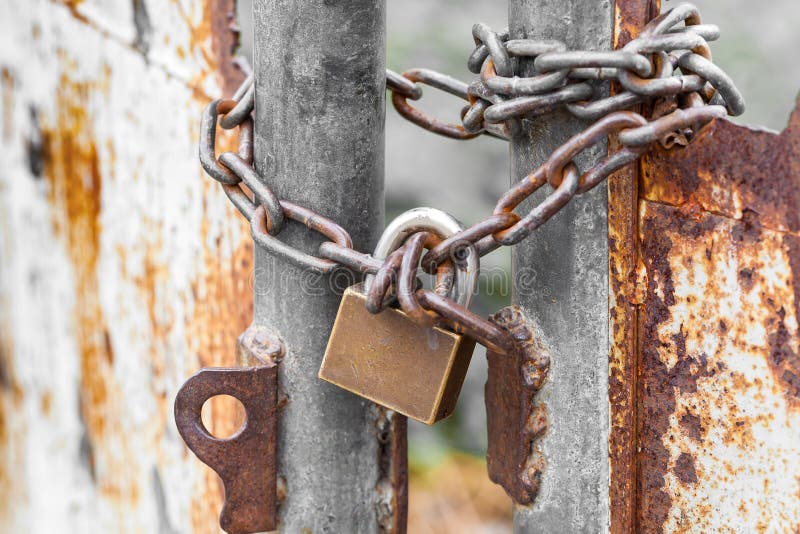 Vintage Rusty Gate with Locked Master Key and Chain Stock Photo - Image ...