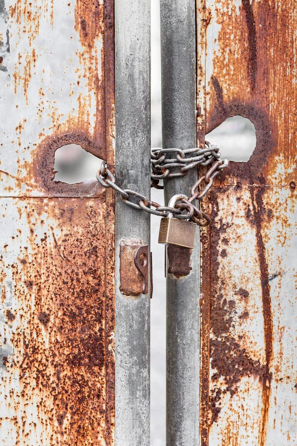 Vintage Rusty Gate with Locked Master Key and Chain Stock Photo - Image ...