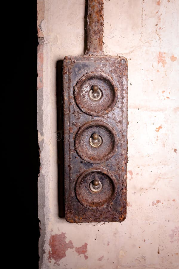 Vintage Rusty Triple Light Switch Panel from Urbex Exploration. Stock ...