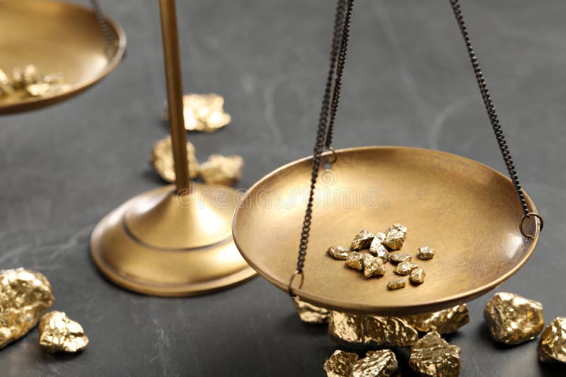 Vintage Scales with Gold Nuggets on Black Marble Table Stock Image ...