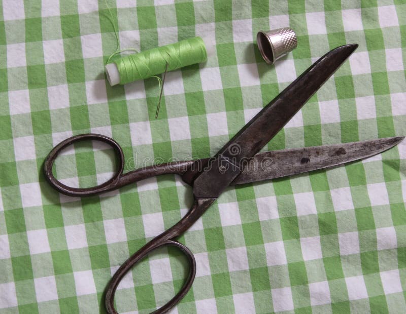 Vintage Scissors on Green Checkered Fabric with Thread and Thimble ...