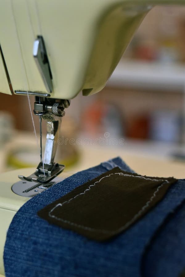 Vintage Sewing Machine Close Up with Jeans. Hobbies and Leisure. Stock ...