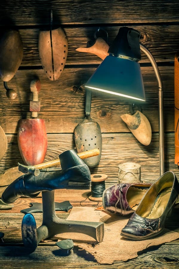 Vintage Shoemaker Workshop with Leather and Tools Stock Image - Image ...