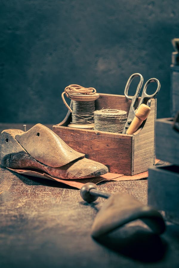 Vintage Shoemaker Workshop with with Tools, Anvil, Shoes and Rule Stock ...