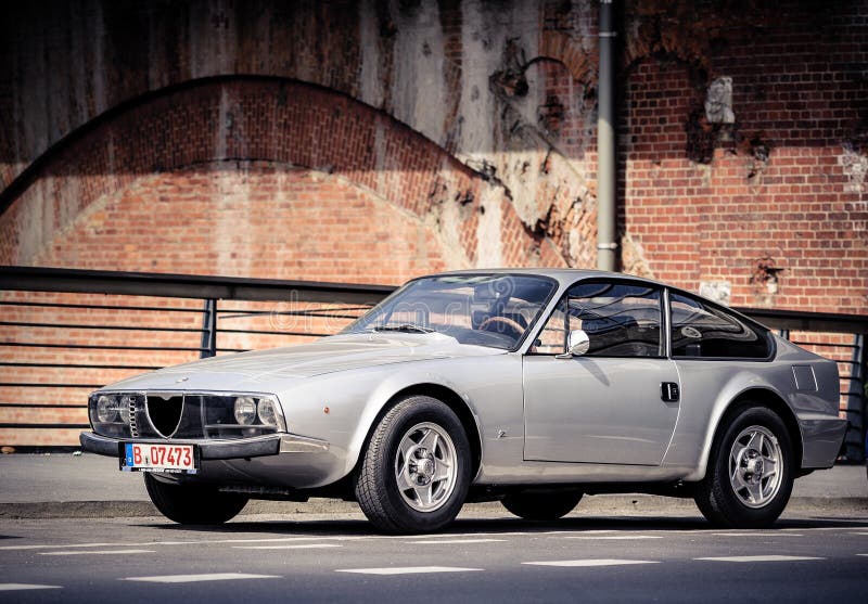 Vintage Silver Car with Brick Archway Background Editorial Photo ...