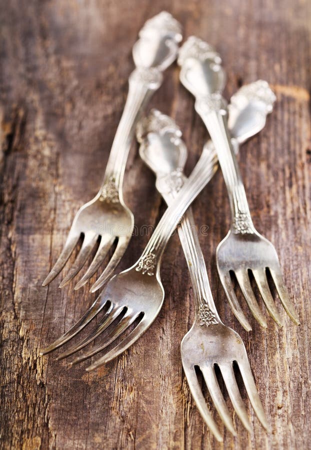 Vintage Silverware Forks on Rustic Wooden Table Stock Image - Image of ...