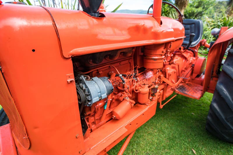 Vintage Small Red Tractor by the Lake Stock Photo - Image of color ...