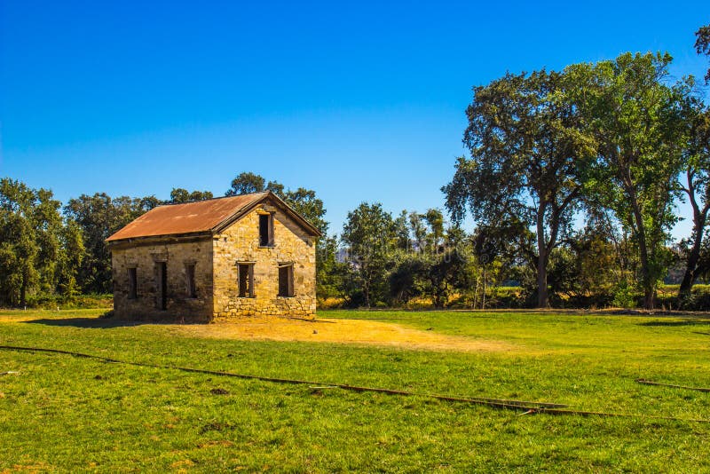 Vintage Stone Building in Field Stock Photo - Image of rusted ...