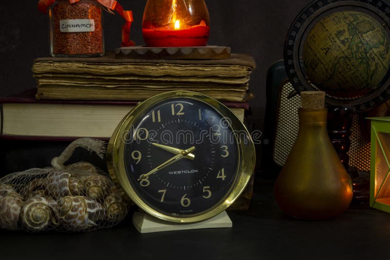 Vintage Study Table View with Books and Golden Clock in Front Stock ...