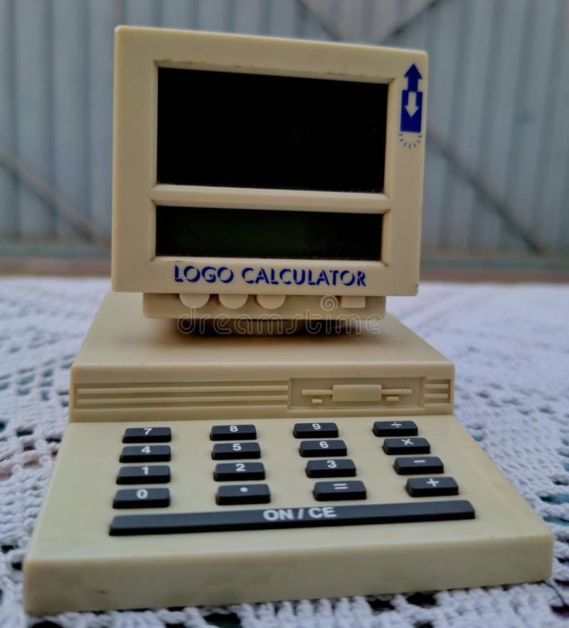 A Vintage-style Calculator Toy Resembles an Old Computer. it Has a ...