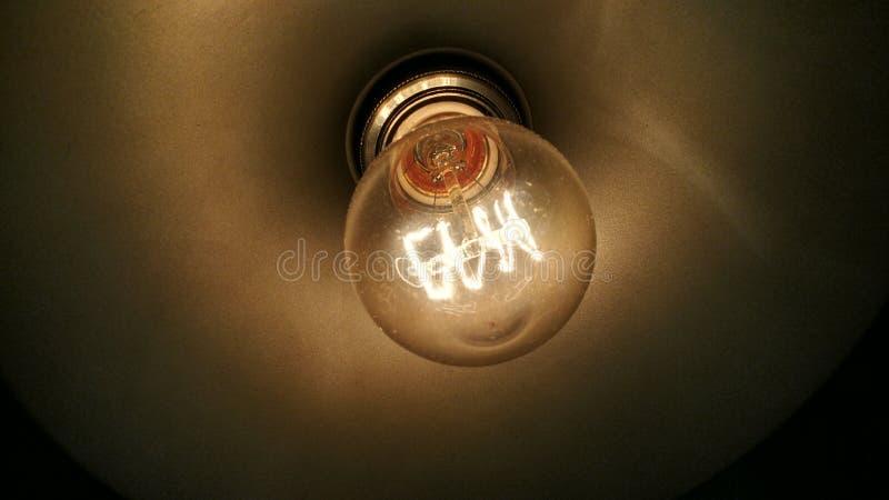 Filament Inside Warm Light Bulb Stock Photo - Image of classic ...