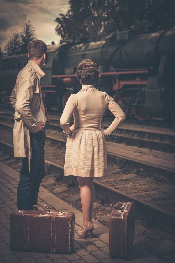 Vintage style couple stock photo. Image of locomotive - 36530578