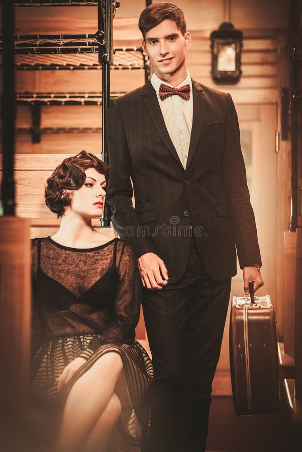 Vintage style couple stock photo. Image of journey, railway - 48893578
