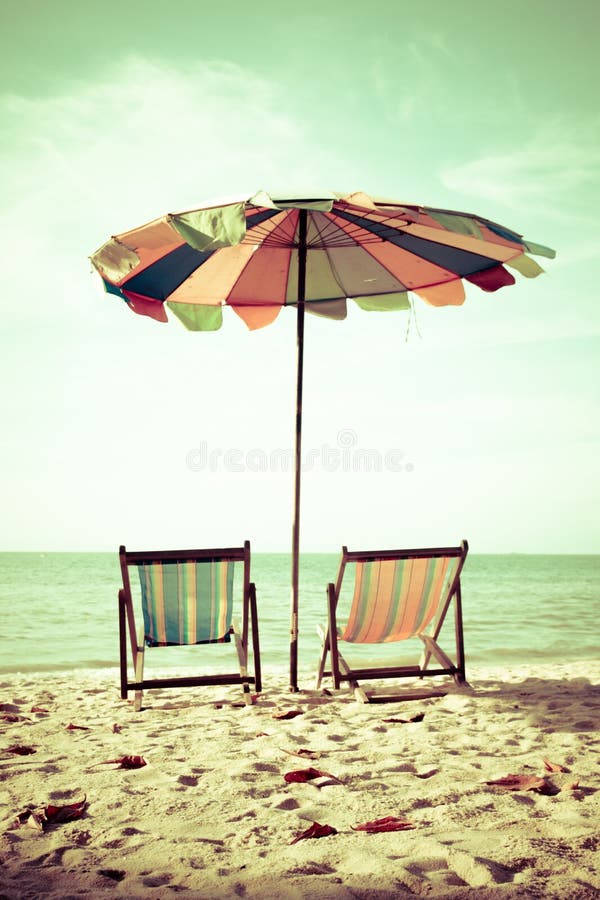 Style Deck Chairs on a Sunny Beach Facing the Tranquil Sea Stock Image ...